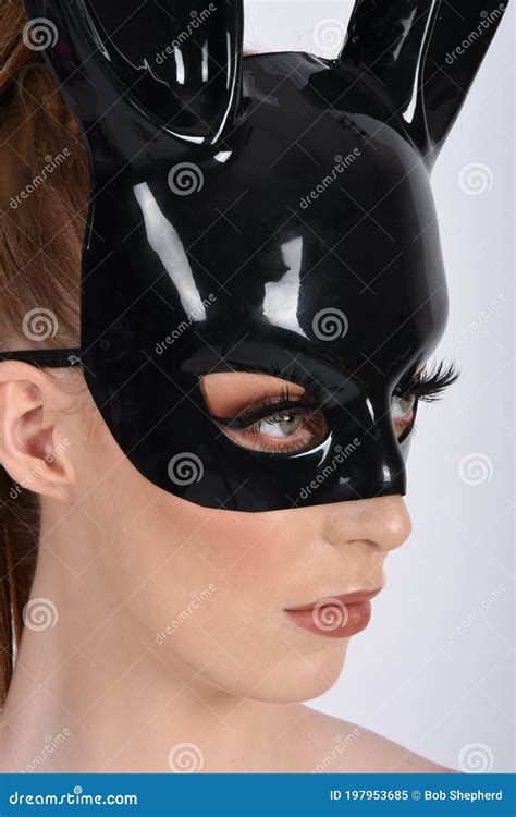 Beautiful Tall Slim Busty Redhead Model Dressed In A Black Latex