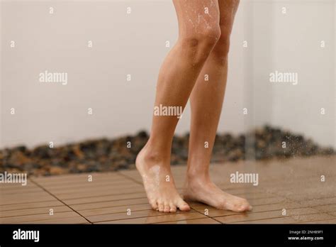 Woman Under The Trickles Of Water In Pleasure Shower Girl Under The