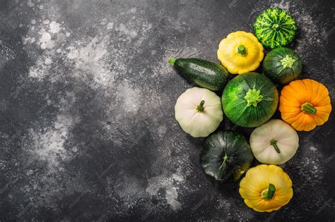 Premium Photo Summer Squashes On Textured Concrete Backdrop With Copyspace Top View