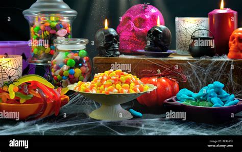 Happy Halloween Trick Or Treat Party Table With Bowls And Apothecary