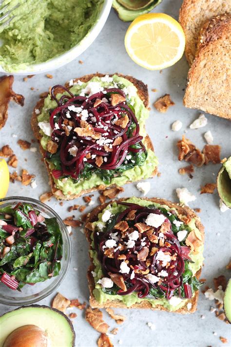 Avocado Toast With Spiralized Beets Garlic Swiss Chard Bacon And Feta
