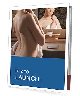 Naked Female Model Posing Gracefully Beside A Mirror Presentation