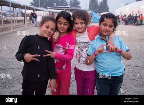 Syrian Kurdish Girls Become Friends In The Refugee Camp Of Idomeni Greece Near The Macedonian