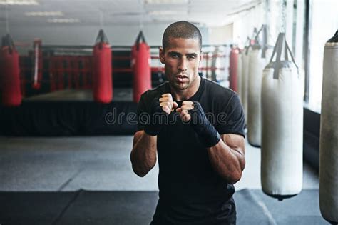 Portrait Punching And Man In Gym For Exercise Boxing Challenge Or