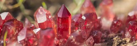 Ruby Crystals Glimmer Under Sunlight In A Natural Setting Stock Image