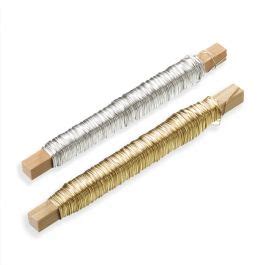 Metallic Wire On Wooden Stick