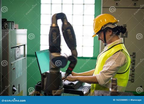 Worker Control Robot Arm By Computer Stock Image Image Of Auto