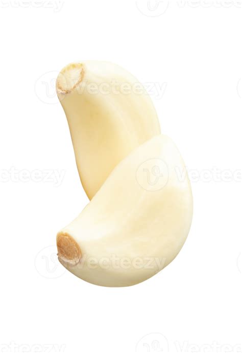 A Vertical Stack Of Two Peeled Garlic Cloves Isolated With Clipping
