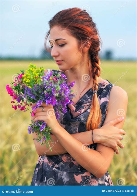 Beauty Girl Outdoors Enjoying Nature Beautiful Teenage Model Girl In Dress On The Spring Field