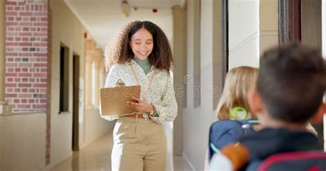 School Clipboard For Attendance And A Teacher With Students For A Head