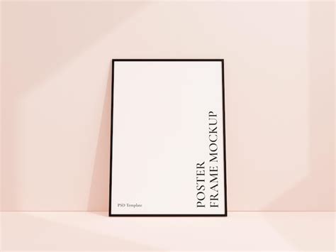 깨끗하고 미니멀한 전면 뷰 세로 검정 사진 또는 포스터 프레임 모형은 흰색 벽 3d 렌더링에 기대어 있습니다 프리미엄 Psd 파일