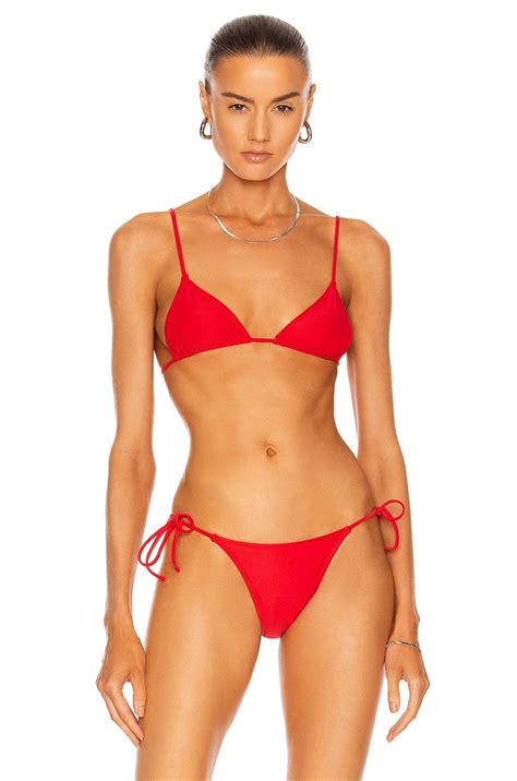 Kylie Jenner Takes In The Sun In A Fiery Red String Bikini