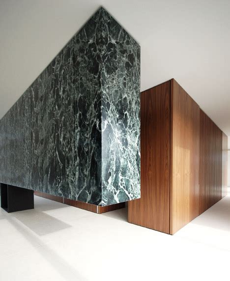 Monolithic Marble Partition Divides Antwerp Penthouse