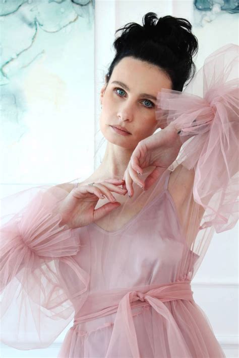 Блуза з обємним рукавом в чорну клітку Vona Dmytra