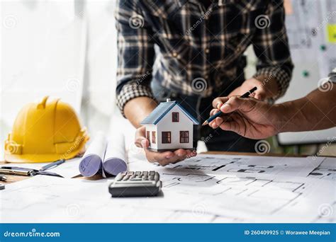 Architect Team Working With Blueprints For Architectural Plan Engineer