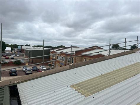 Handrail Scaffolding On A Warehouse In Patridge Green