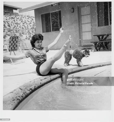 Portrait Of Actress Annette Funicello Sitting On The Edge Of A