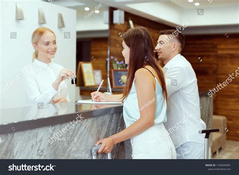 Couple Near Reception Desk Hotel Stock Photo 1160095891 Shutterstock