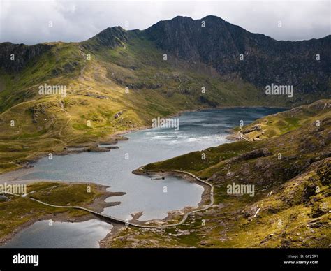 The Lake Of Llyn Llydaw Below The Peak Of Y Lliwedd In Cwm Dyli On The Snowdon Massif Showing