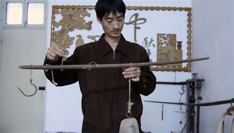 杆秤的工作原理 百度经验