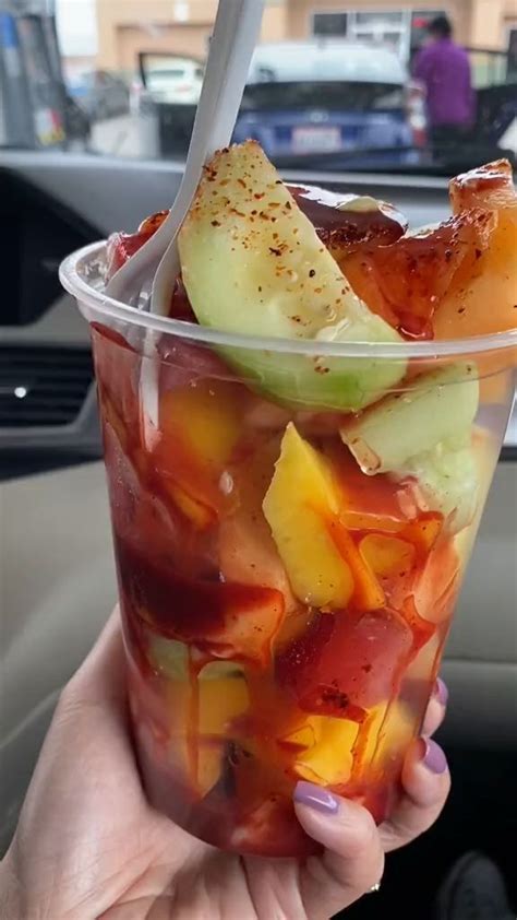 Mexican Fruit Vendors Making Fruit Cups With Chamoy And Tajin Video