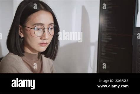 Young Adult Asian Male Female Software Developer Coding Program On Desktop Computer Man Woman