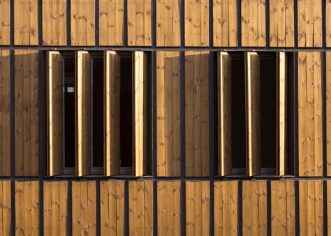lp2 completes office block with louvred wooden facades