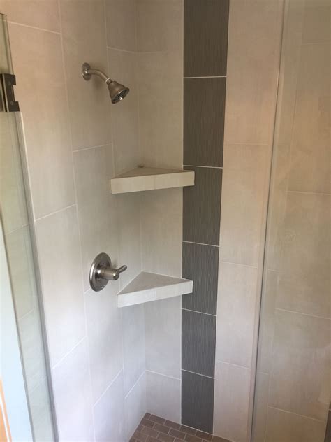 Custom Tiled Shower With 12x24 Tile Installed 13 Staggered Vertically With 8x16 3d Glass Wave