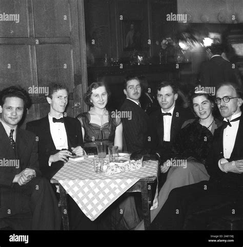 1950s Historical Adults Attending A Black Tie Evening Function