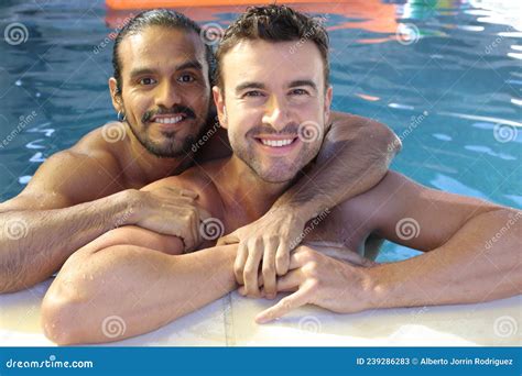 Multicultural Same Sex Couple In The Swimming Pool Stock Image Image