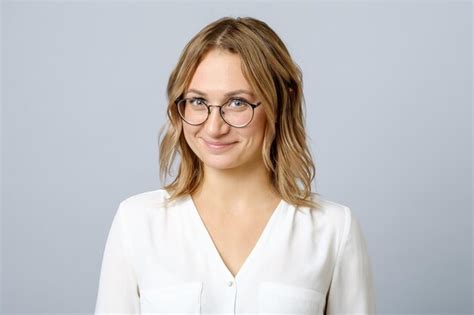 Premium Photo Portrait Of Young Beautiful Shy Girl Smiling Isolated