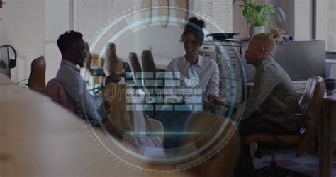 Image Of Cyber Security Text And Firewall Icon Over Diverse Colleagues Discussing At Office