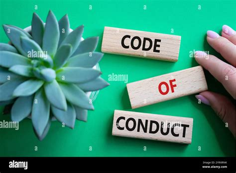 Code Of Conduct Symbol Wooden Blocks With Words Code Of Conduct Beautiful Green Background