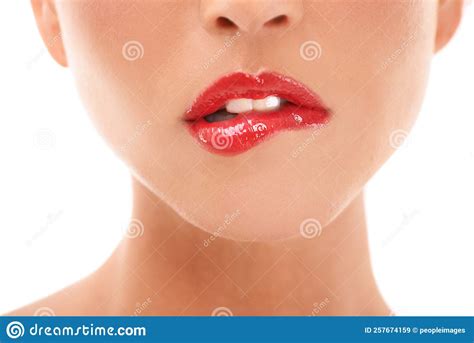 Luscious Lips A Young Woman Biting Her Lip Wearing Red Lipstick