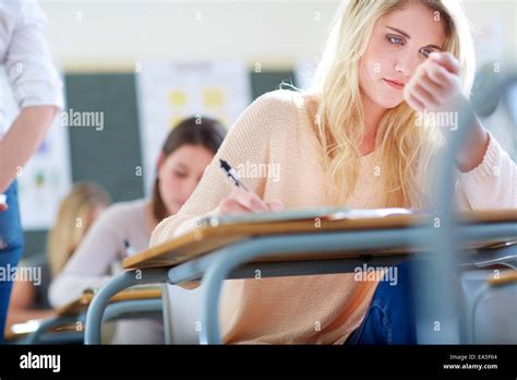 Female Babe In Classroom Cheating During An Exam Stock Photo Alamy