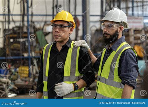 Engineer Discuss With Technician In Factory Man Technician Is Working In A Steel Factory Stock