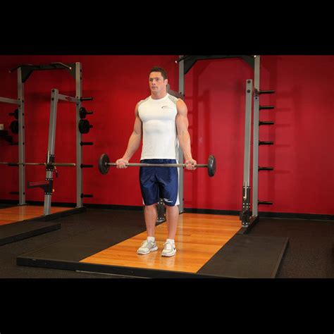 Подъем штанги на бицепс широким хватом Каталог упражнений Бодибилдинг и фитнес бикини