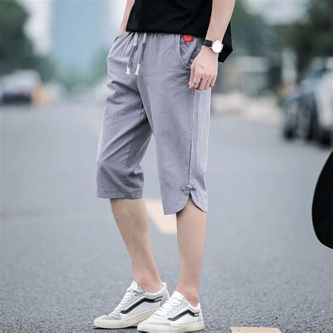 ขายร้อนฤดูร้อนใหม่กางเกงขาสั้นลำลองผู้ชายขนาดบวกผ้าฝ้ายแท้อินเทรนด์ระบายอากาศกางเกงครอบตัดผู้ชาย