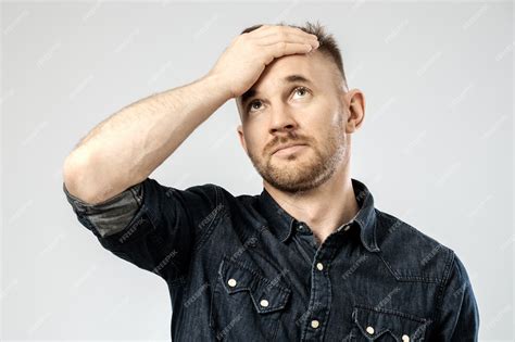 Premium Photo Portrait Of Upset Young Man Isolated
