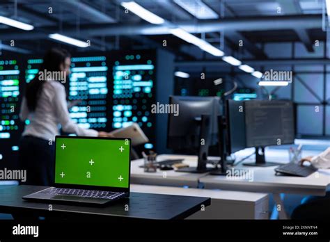 Focus On Isolated Screen Laptop In Data Center Facility Managing Rackmounts Energy Consumption