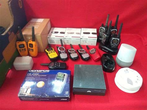 Box Of Assorted Items Including Motorola Walkie Talkie Sierra Auction Management Inc