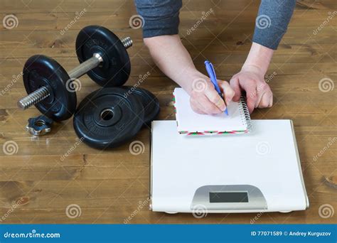 The Record Of The Sports Results In A Notebook Among The Items For