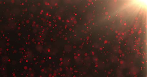 Red Luxury Bokeh On Particles Floating In The Air Dust And Glitter Particles Backgrounds Black