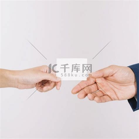 双手交换名片高清摄影大图 千库网