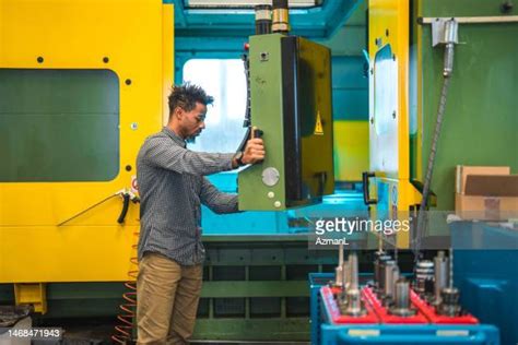 Cnc Machine Operator Photos And Premium High Res Pictures Getty Images