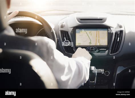 GPS Navigation System Person Driving A Car With Satellite Navigation Stock Photo Alamy