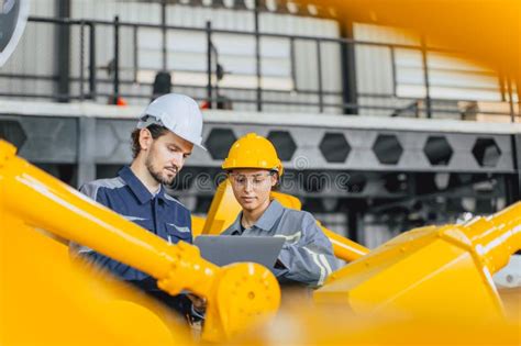 Engineer Team Working Together Inspection Quality Robot Arm In Robot