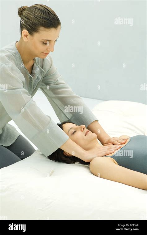 Massage Therapist Giving Woman Chest Massage Stock Photo Alamy