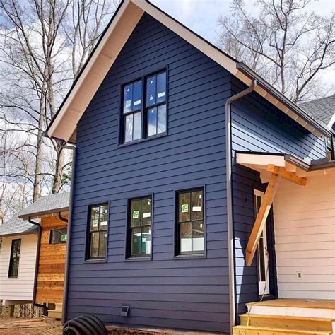 Blue Siding And Black Windows At Declan Fell Blog