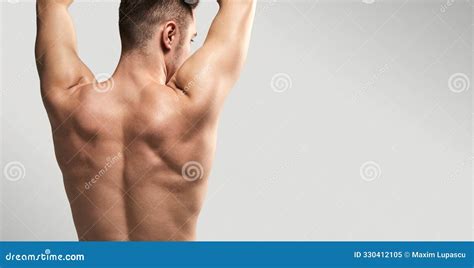 Fit Muscular Man Stretching With Defined Back Muscles Stock Image Image Of Fitness Exercise